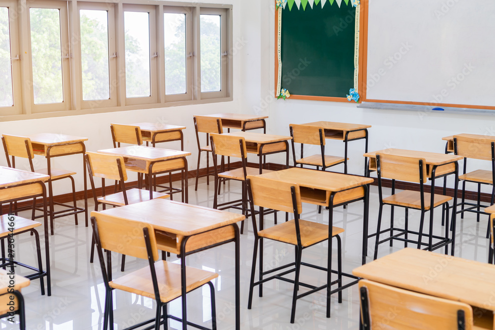 Lecture room or School empty classroom with desks and chair iron wood ...