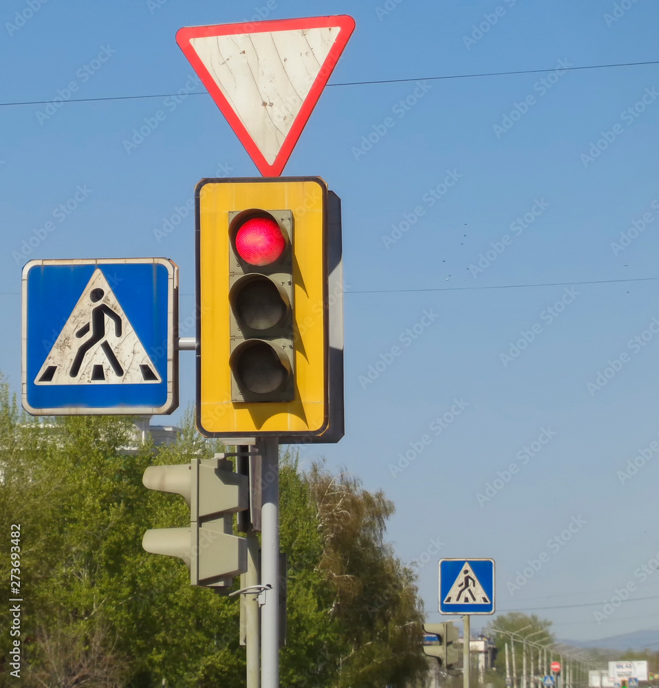 Traffic lights and road signs. Red traffic signal. Stoplight. Urban ...