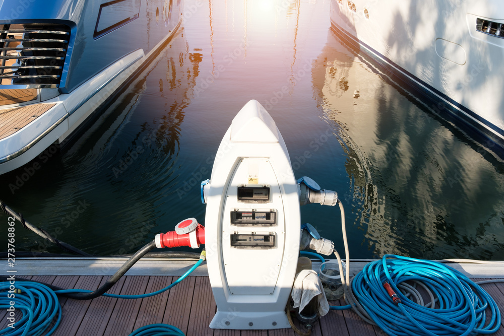 Electrical station outlets to charge ships in harbor Stock Photo ...