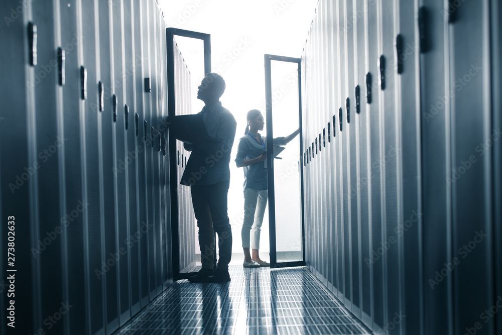 Technical staff in the computer room maintenance Stock Photo | Adobe Stock