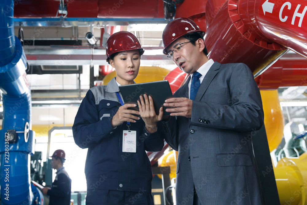 Technical personnel in the factory inspection Stock Photo | Adobe Stock