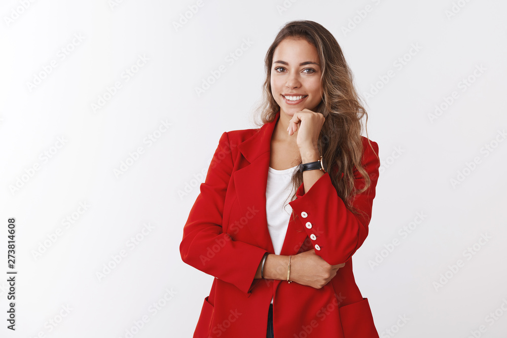 Successful good-looking office manager wearing red jacket holding hand ...