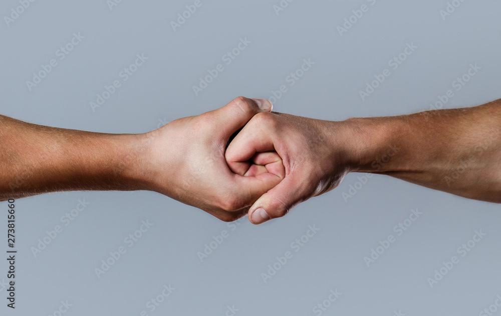 Rescue, helping hand. Male hand united in handshake. Man help hands ...