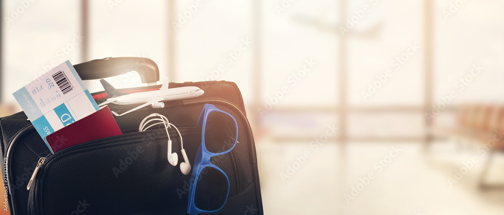 Photo & Art Print traveling luggage on airport terminal background with ...