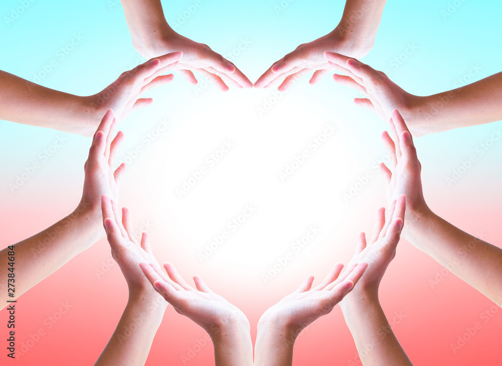 International Day of Friendship concept: hands in shape of heart on ...