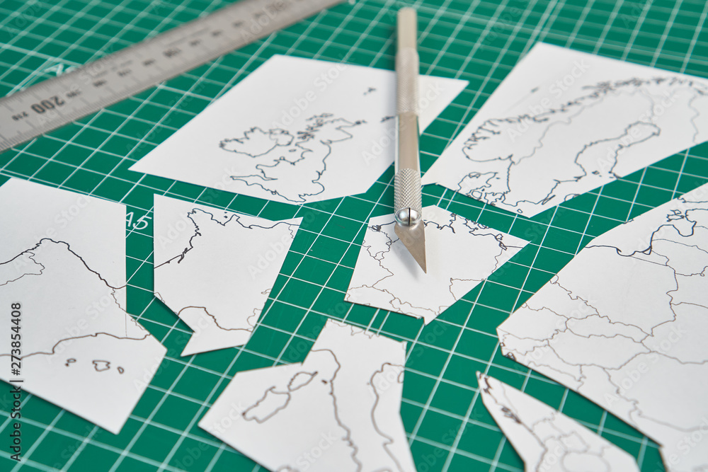europe map with a ruler and a cutter Stock Photo | Adobe Stock