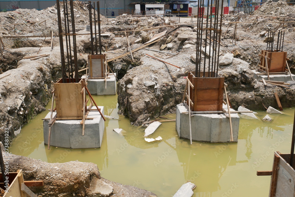 Pile cap and column stump under construction at the construction site ...