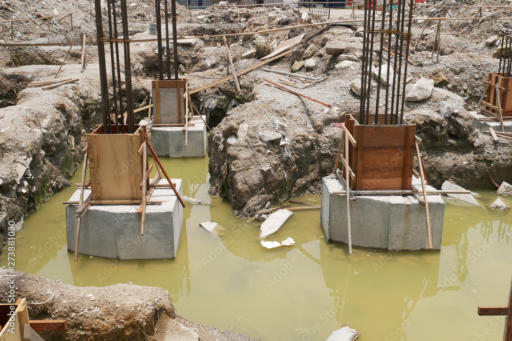 Pile cap and column stump under construction at the construction site ...