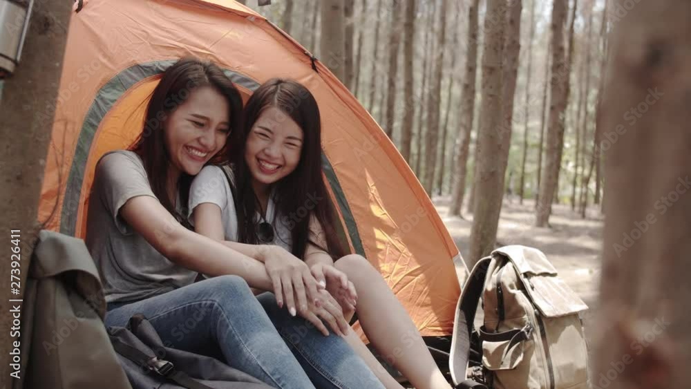 Video Stock Lgbt lesbian women couple camping or picnic together in ...