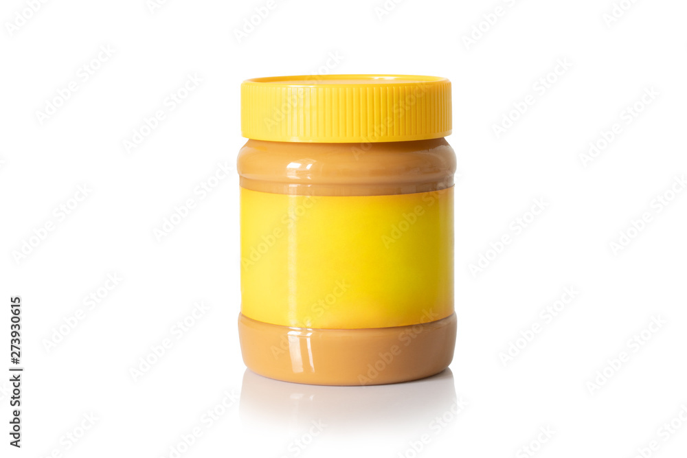 Jar of creamy peanut butter with yellow cap and yellow label isolated ...