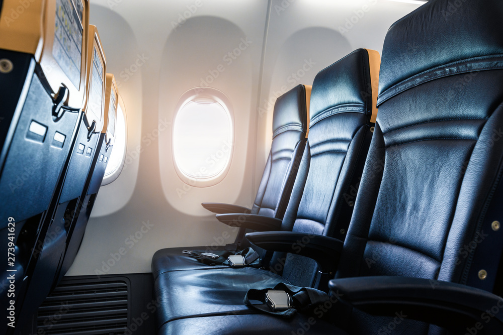 Plane interior - cabin with modern leather chair for passenger of ...