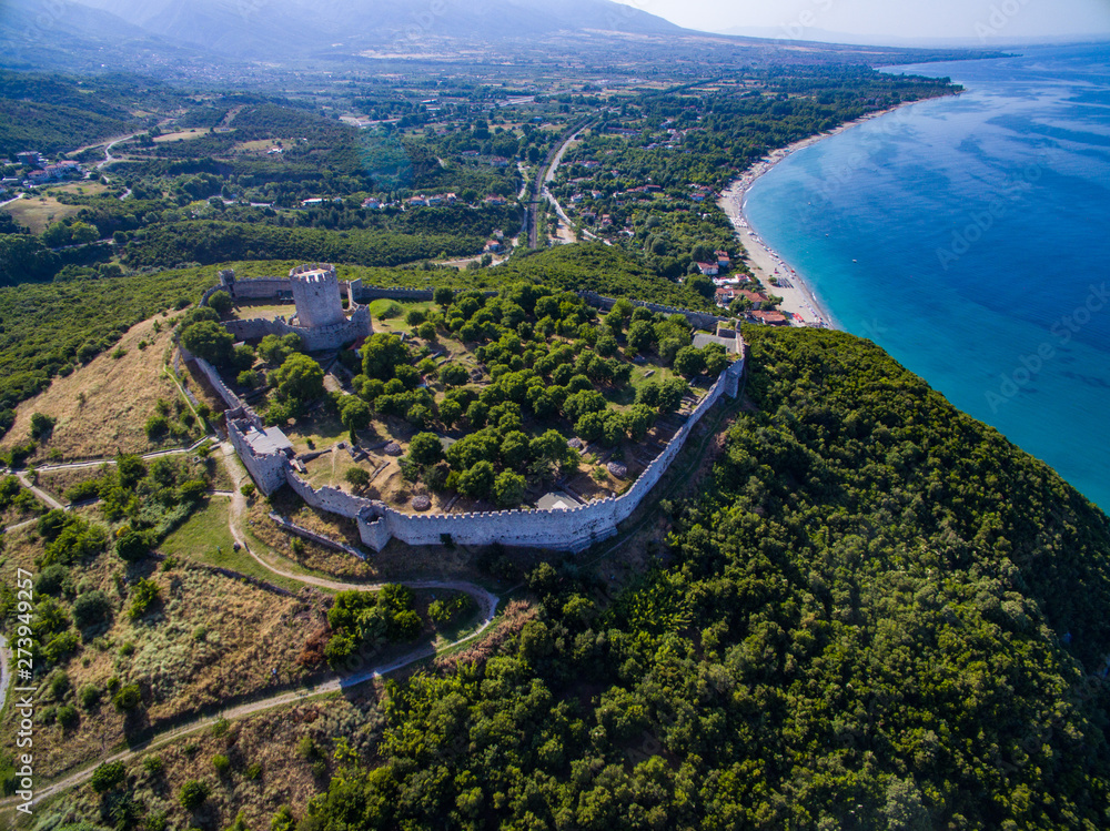 An aerial perspective of the medieval castle of platamonas on the top ...