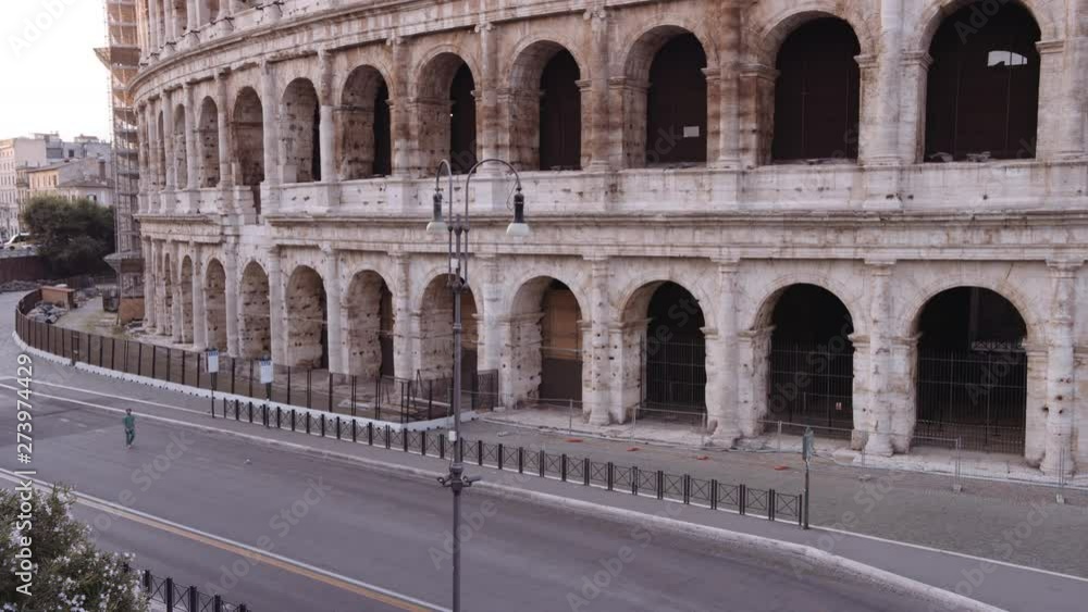 In a semi-abandoned Rome a survivor walks near Coliseum "Colosseo ...