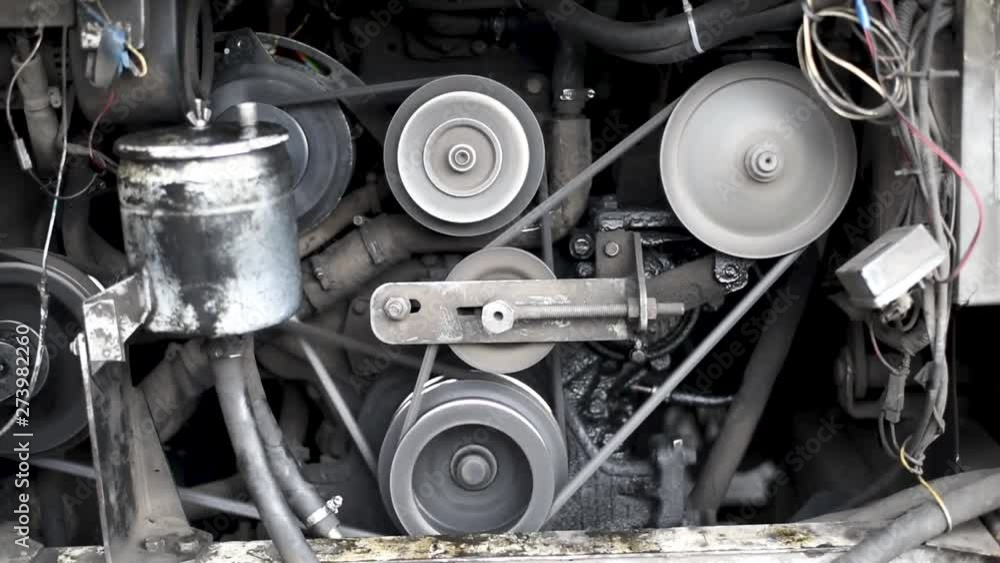 The engine of the car, in a running car, the movement of the belt ...