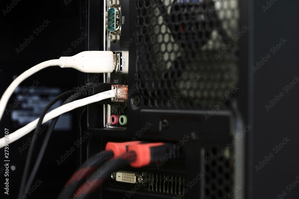 back of a pc computer. socket connect with multiple ports. many USB ...