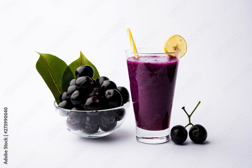 Juice of jamun fruit in a glass also called as java plum, jambolan plum ...