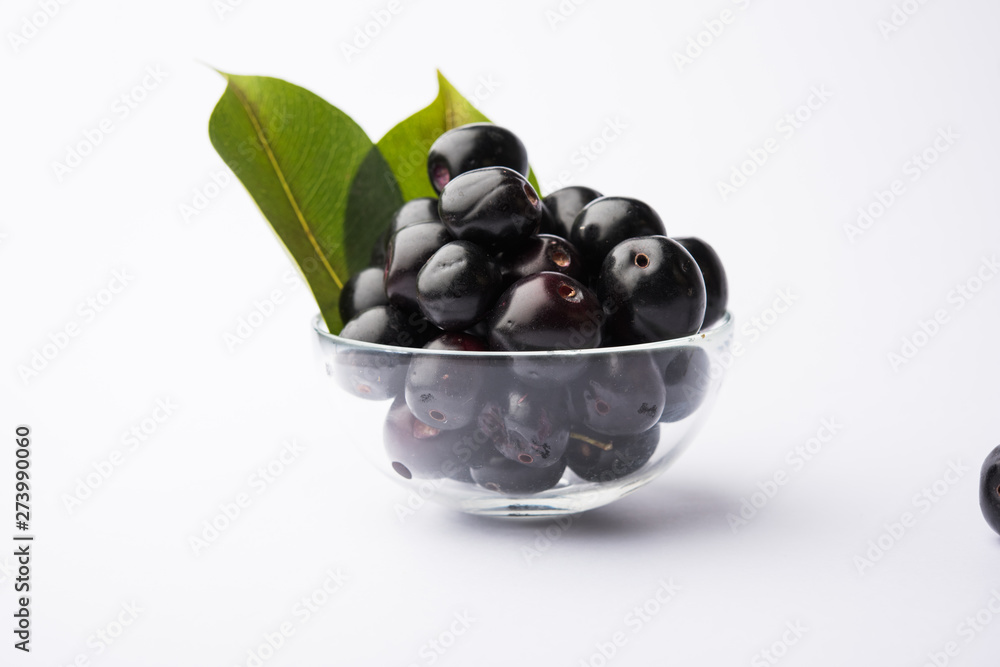 Juice of jamun fruit in a glass also called as java plum, jambolan plum ...