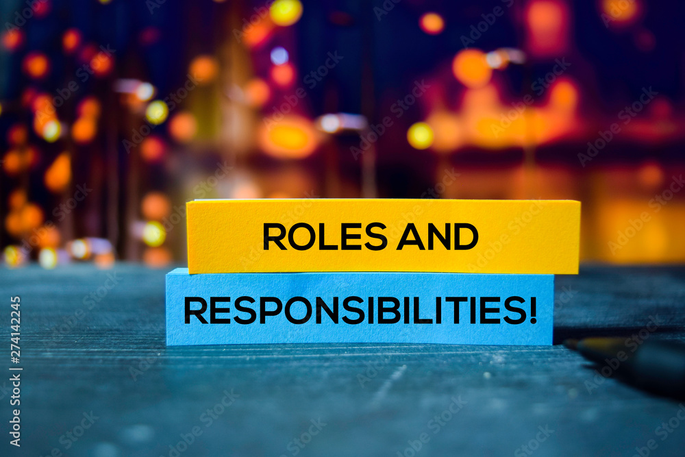 Roles and Responsibilities! on the sticky notes with bokeh background ...