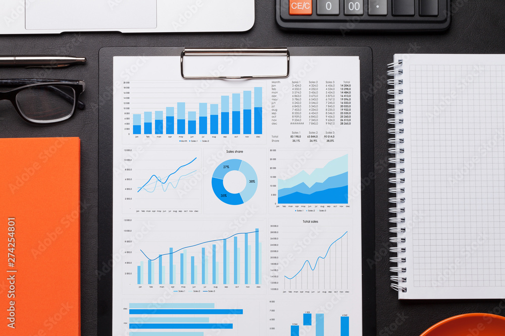 Office workplace table with reports Stock Photo | Adobe Stock