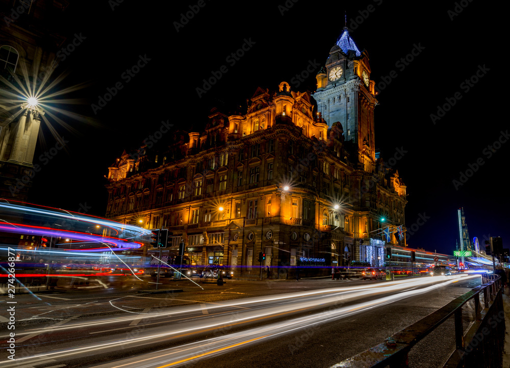 Streets of Edinburgh, Scotland, at night with light trails of street ...