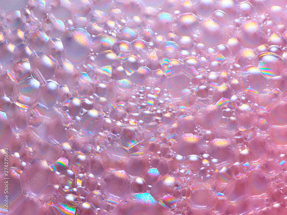 Iridescent bubbles on pink surface Stock Photo | Adobe Stock