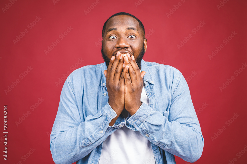 Omg. Portrait of pop-eyed funny young black man looking ahead of him ...