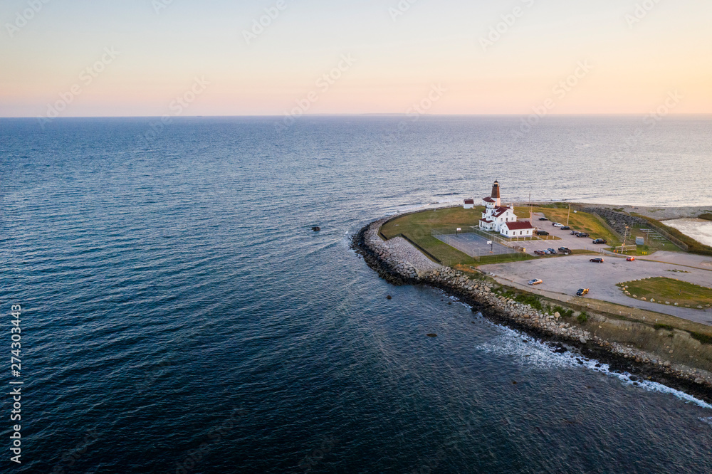 Point Judith Lighthouse and Coast Guard Station at sunset Aerial Stock ...