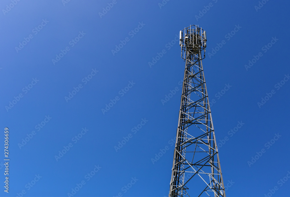 Telecommunication tower or mast with microwave, radio panel antennas ...