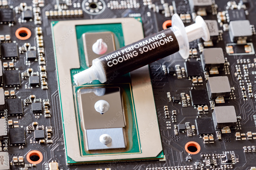 applying thermal grease to cpu closeup modern processor Stock Photo ...