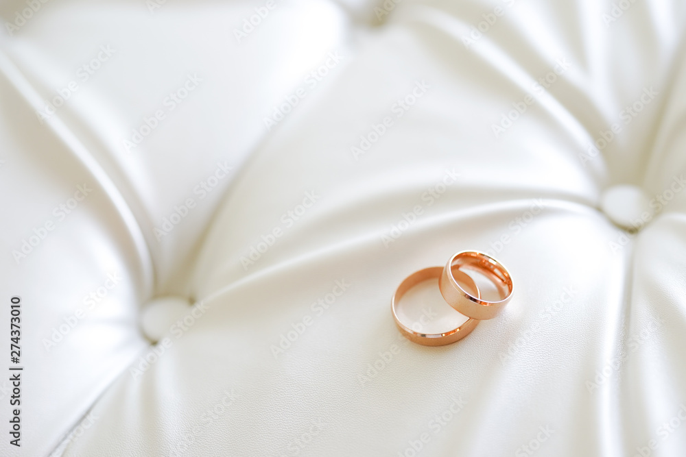 Panoramic banner of two gold wedding rings symbolic of love and romance ...