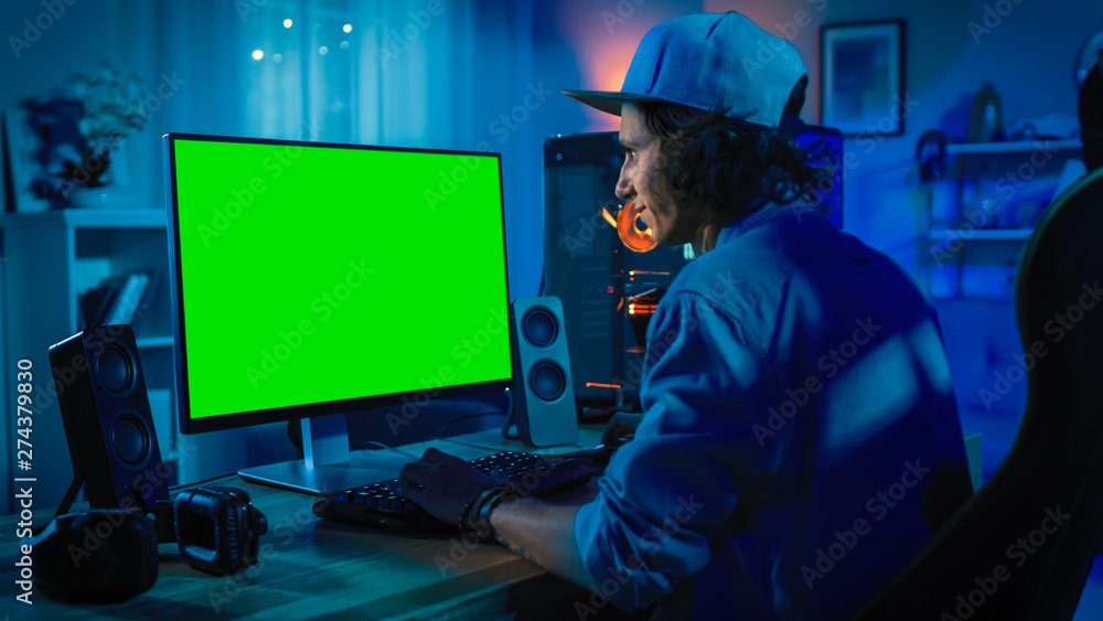 Professional Gamer Playing Online Video Game on His Powerful Personal ...