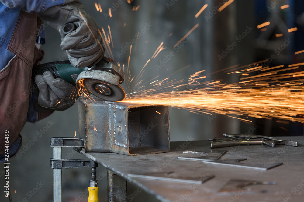 Grinding of materials in metallurgy workshop Stock Photo | Adobe Stock