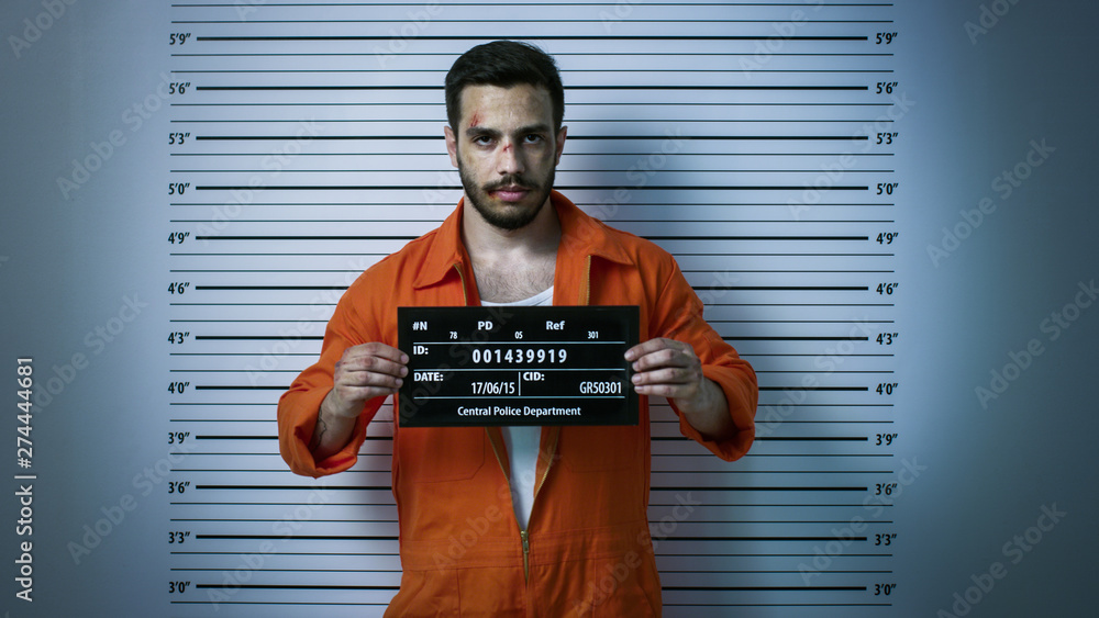 In a Police Station Arrested Man Getting Front-View Mug Shot. He's ...