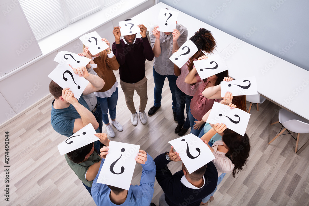 Group Of People Holding Question Mark Sign Stock Photo | Adobe Stock