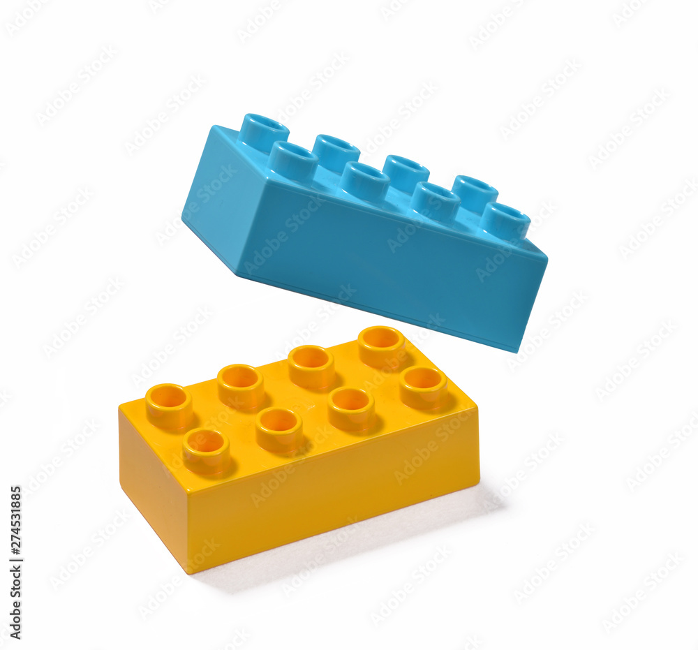 Ladrillos de plastico aislado sobre fondo blanco Stock Photo | Adobe Stock