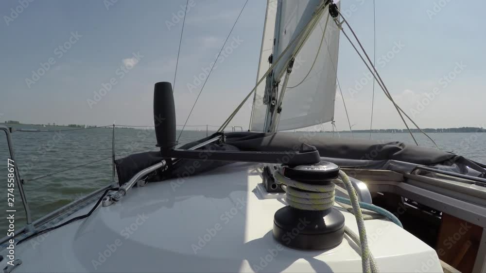 Onboard footage of small sailing boat a sloop is vessels with a ...