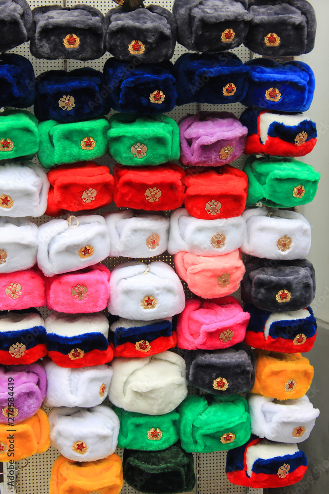 Colorful russian ushanka fur hats with symbols of Russia and Soviet ...