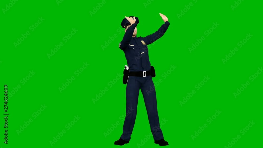 Policeman dancing rhythmic modern dance on a green screen. Looped ...