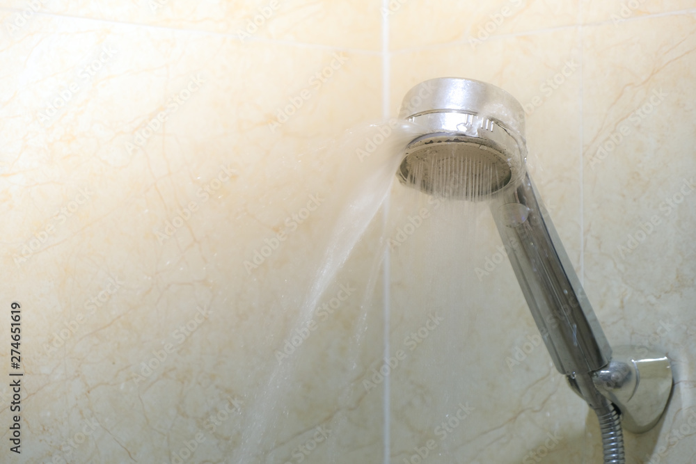 Drops of water from the damaged shower, leak water and rust on the ...