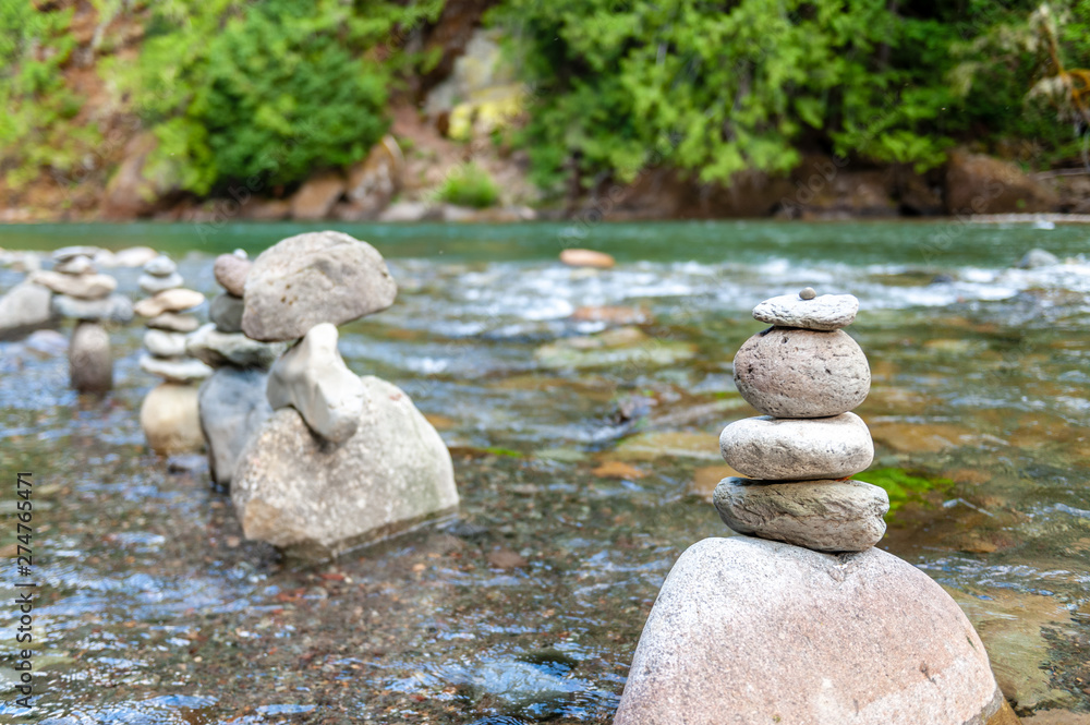 Boulders stacked into a formation of rocks in the Cowlitz river, near ...