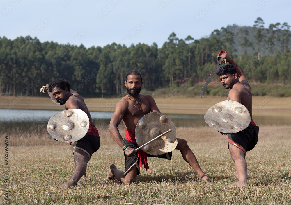 Indian fighters with sword and shield - Kalaripayattu marital art ...