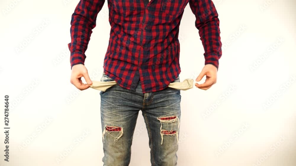 Vidéo Stock Man showing his empty pockets, turning his pockets inside ...
