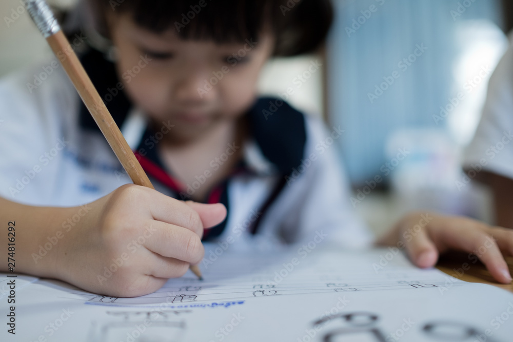 children girl doing homework with mother, kid write paper, family ...