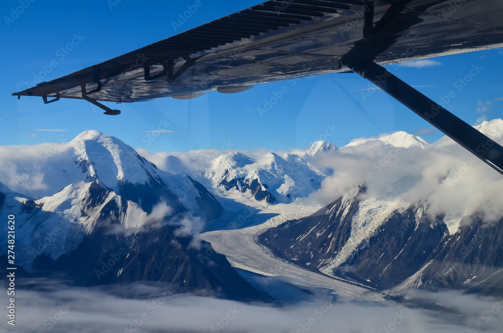 Aerial view of Alaska mountaion range around Denali peak from a plane ...