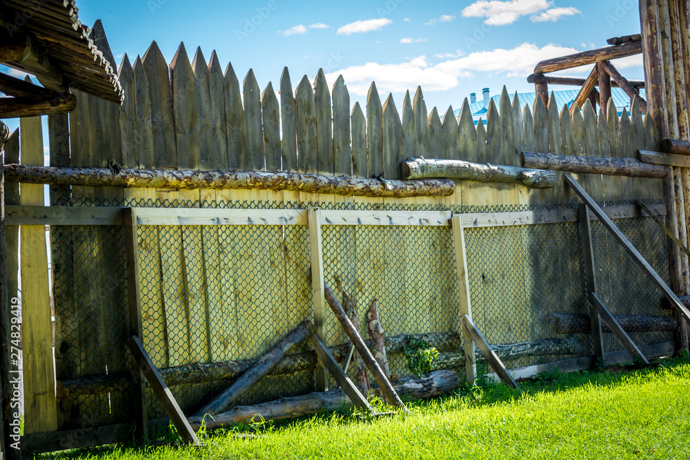 Medieval wooden fence made of palisade Stock Photo | Adobe Stock