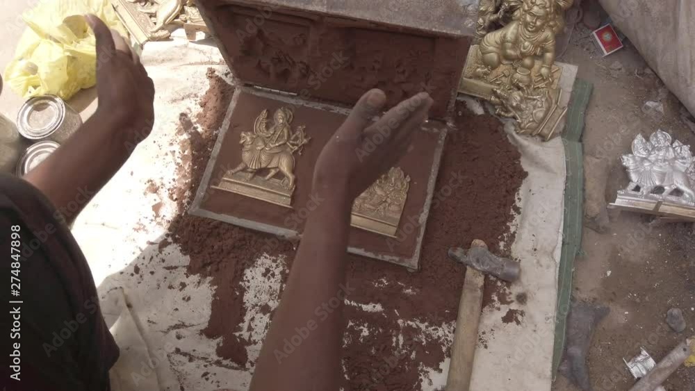 Indian metal workers casting Hindu God and Goddess idols using recycled ...