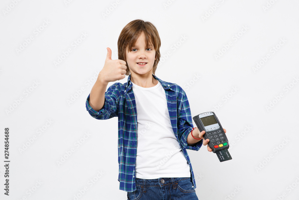 Kid boy in blue t-shirt hold wireless bank payment terminal to process ...