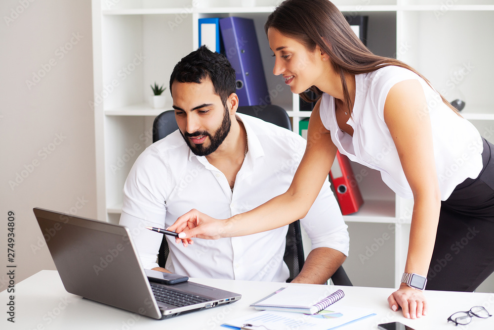 Side view portrait of man and woman armwrestling, exerting pressure on ...