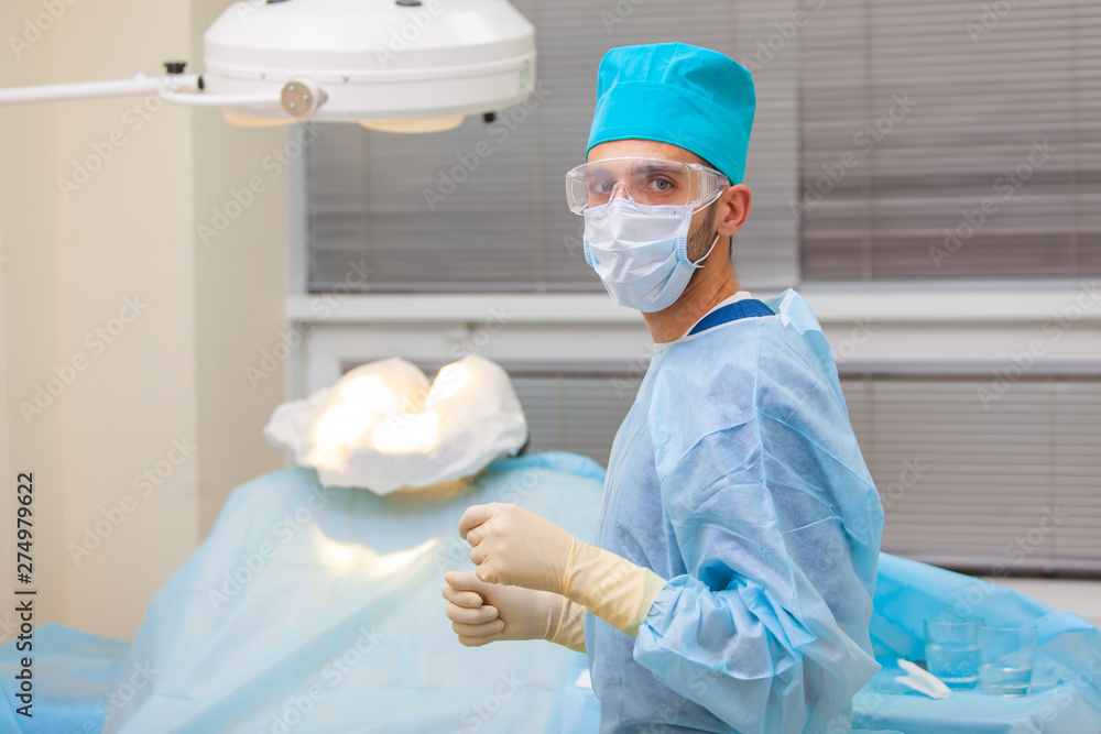 Portrait of surgeon. Baldness treatment. Hair transplant. Surgeons in ...