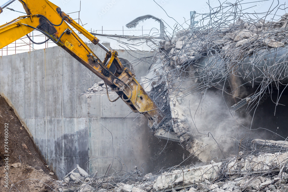 Professional demolition of reinforced concrete structures using ...